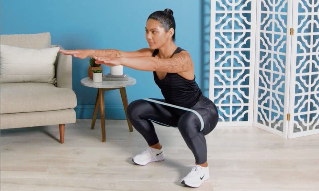 What are the best exercises to do with a resistance band for building strength at home? - FITPAA